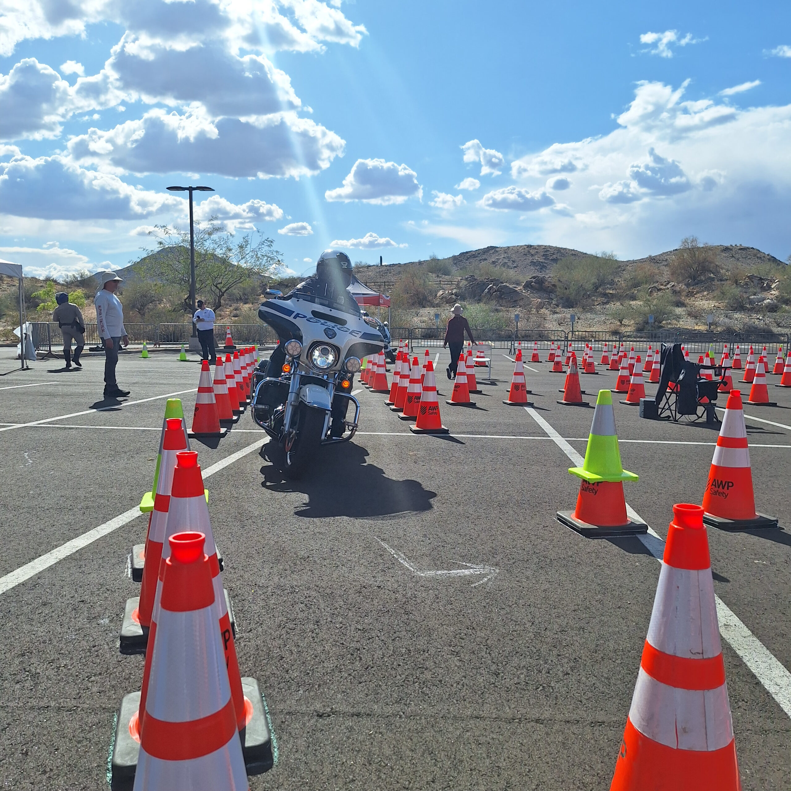 Officer maneuvering through cones | Road Guardians